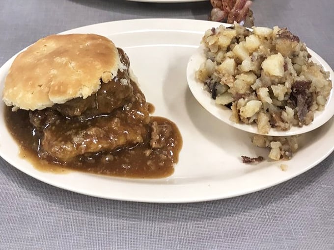 Country-style steak smothered in rich brown gravy alongside home-fried potatoes – Southern comfort that hugs your soul from the inside out.