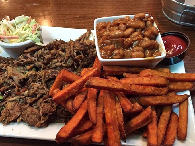Pulled pork that actually pulls apart – not chopped or shredded – alongside sweet potato fries and baked beans that aren't playing supporting roles.