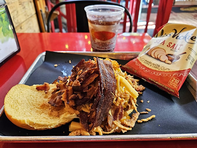 This isn't just lunch—it's an architectural marvel of smoked meat, melted cheese, and golden bread that would make Frank Lloyd Wright hungry.