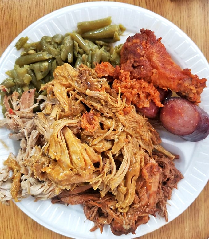 Pulled pork so tender it practically surrenders to your fork, alongside green beans that haven't forgotten their Southern roots. This is barbecue poetry.