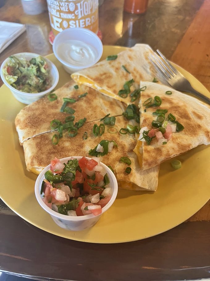 Quesadillas that could make your abuela nod in approval, served with fresh pico and guacamole that puts store-bought versions to shame.