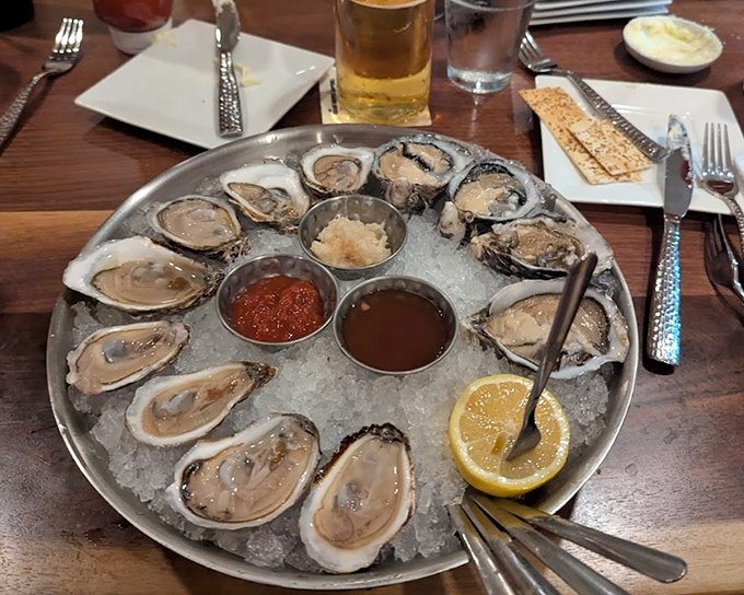 Fresh oysters on ice, glistening like jewels from the sea. A briny treasure chest that captures the essence of coastal dining.
