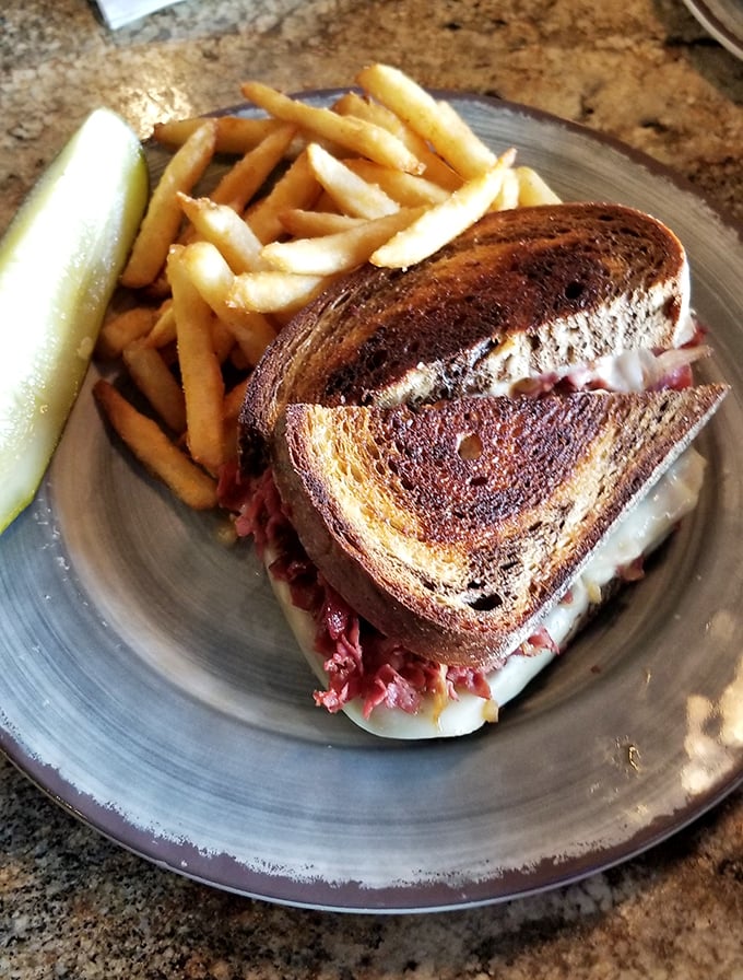 A proper Reuben should require both hands and several napkins. This beauty, with its perfectly grilled rye, clearly understood the assignment.
