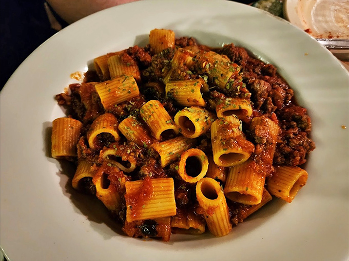 Rigatoni Bolognese that doesn't just sit on the plate – it practically demands to be twirled, savored, and remembered long after dinner ends.