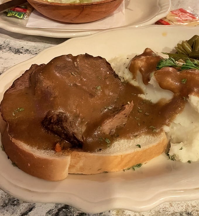 Comfort food royalty: tender roast beef on sourdough with gravy that would make your grandmother both jealous and proud at the same time. 