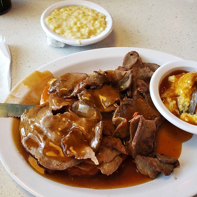 This isn't just roast beef; it's a brown gravy waterfall cascading over tender meat—comfort food that speaks a universal language.