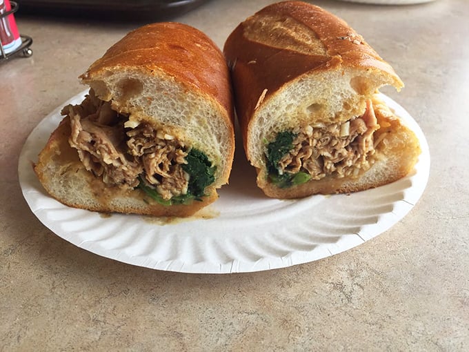 The roast pork with broccoli rabe creates that perfect marriage of savory meat and slightly bitter greens—a relationship counselor couldn't design a better match.
