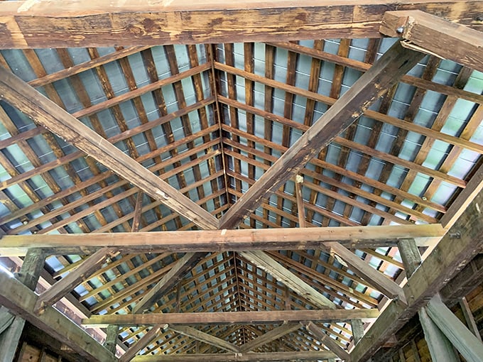 The ceiling's intricate lattice work—like a wooden kaleidoscope that changes patterns with each visit. No two views ever quite the same.