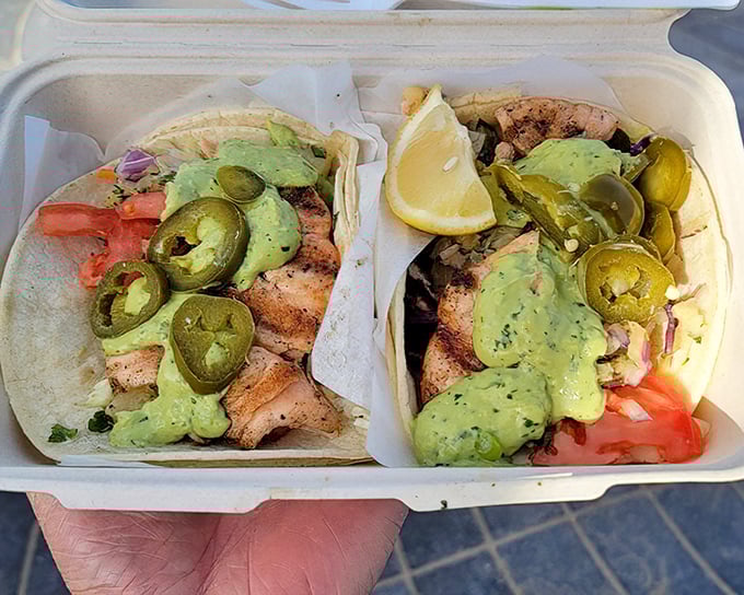 These fish tacos aren't just a meal; they're a California dream wrapped in a tortilla, where jalapeños and avocado create the perfect coastal harmony.