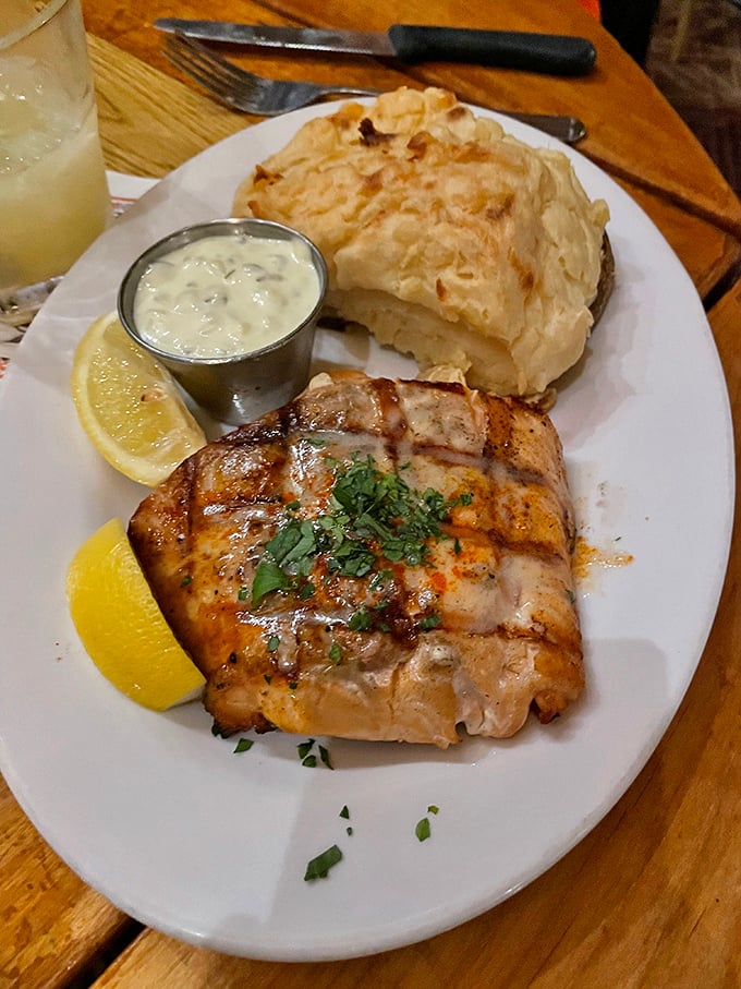 This grilled salmon with a twice-baked potato isn't just dinner—it's edible architecture. The fish flakes with just a gentle nudge of your fork.