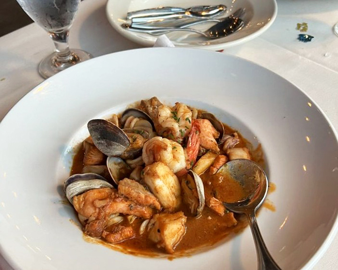 A symphony of seafood swimming in savory broth—this cioppino doesn't just feed your hunger, it tells stories of the Pacific in every spoonful.