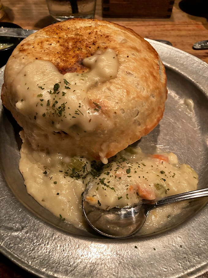 Golden-crusted seafood pot pie arrives like a treasure chest of oceanic delights waiting to be discovered.