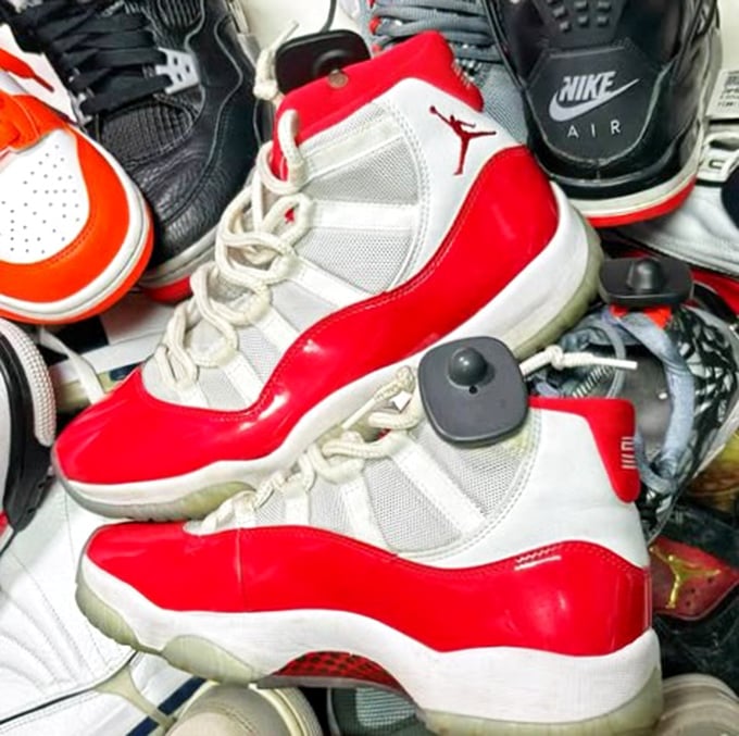 Those red and white Jordans aren't just shoes – they're conversation starters at thrift store prices.