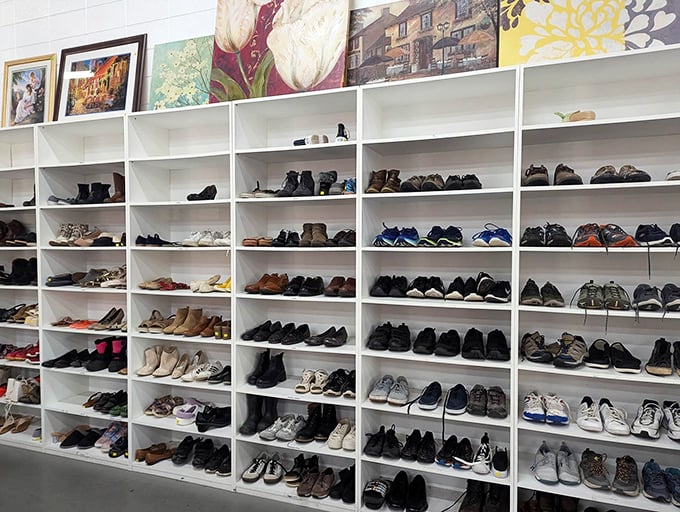 Footwear fantasies come true in the meticulously organized shoe section, where barely-worn boots and pristine pumps await new adventures.