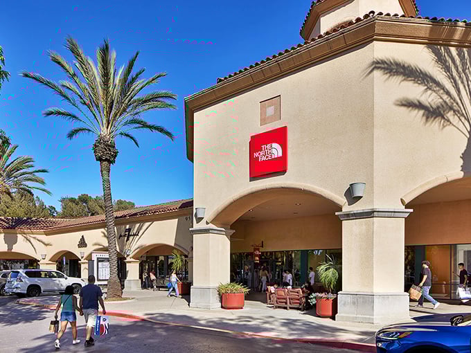 The North Face store beckons outdoor enthusiasts and mall walkers alike – because nothing says "I might climb a mountain someday" like discounted gear.