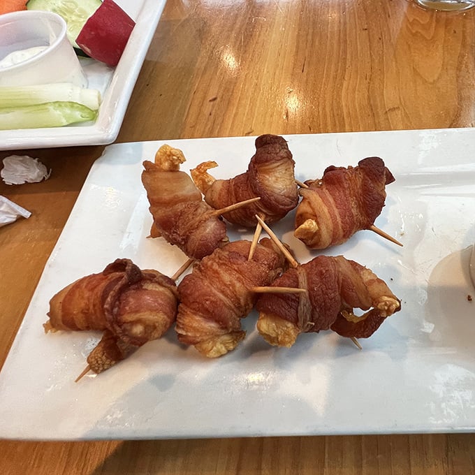 Bacon-wrapped shrimp: Where pork meets seafood in a dance so perfect, it deserves its own Broadway show.