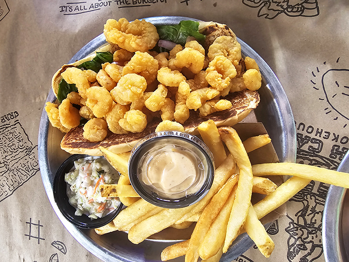 Not all heroes wear capes—some come on a bun with crispy shrimp spilling over the edges and a side of perfectly golden fries.
