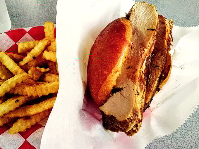 This sandwich isn't just lunch—it's an engineering marvel of smoked turkey and golden fries that makes your sad desk lunch weep with inadequacy.