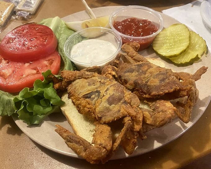 The soft shell crab sandwich—nature's perfect moment of vulnerability transformed into crispy, savory perfection. A seasonal delicacy worth planning your calendar around.