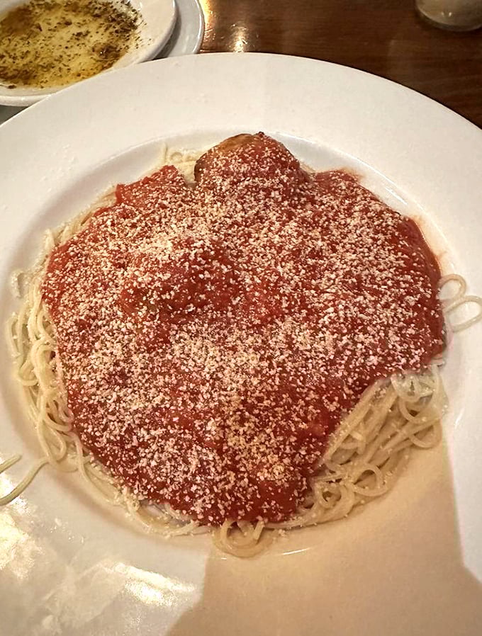 Spaghetti and meatballs—the Sinatra of Italian-American cuisine—gets the star treatment with a generous dusting of cheese and a sauce worth sopping up with extra bread.