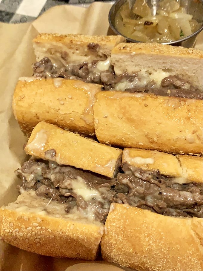 Behold the steak sandwich that makes locals forget about cheesesteaks. That melty cheese-to-meat ratio deserves its own mathematical equation.