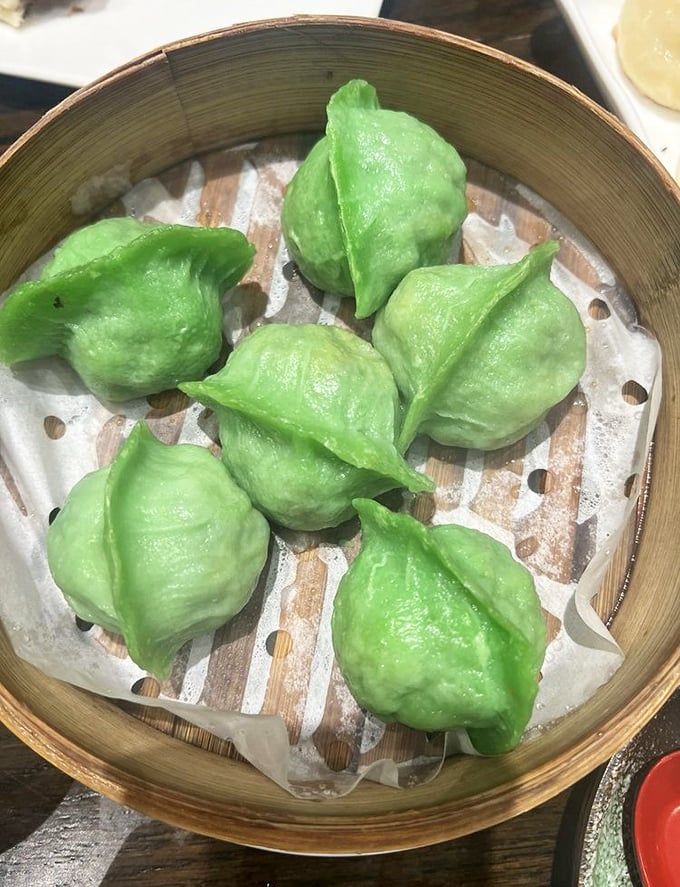 These jade-colored dumplings aren't just pretty faces – they're little pouches of vegetable goodness waiting to brighten your day.