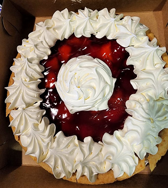 This isn't just pie – it's edible architecture. That meringue has more impressive peaks than the Rockies and twice the sweet satisfaction.