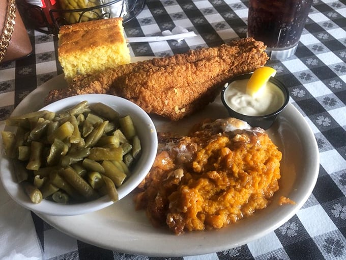 That sweet potato casserole and cornbread could make a grown person cry. Pair it with those green beans and you've got the holy trinity of Southern sides.
