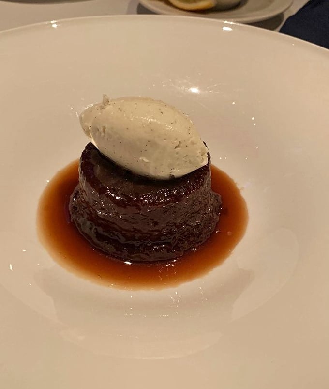 Sticky toffee pudding that doesn't just satisfy your sweet tooth – it writes it love sonnets, with that scoop of vanilla ice cream slowly surrendering to warm caramel.