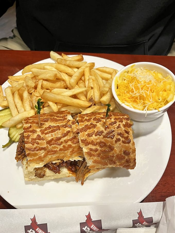 This tri-tip sandwich with its perfect grill marks could make a vegetarian weep. Paired with golden fries and cheese – a California classic.
