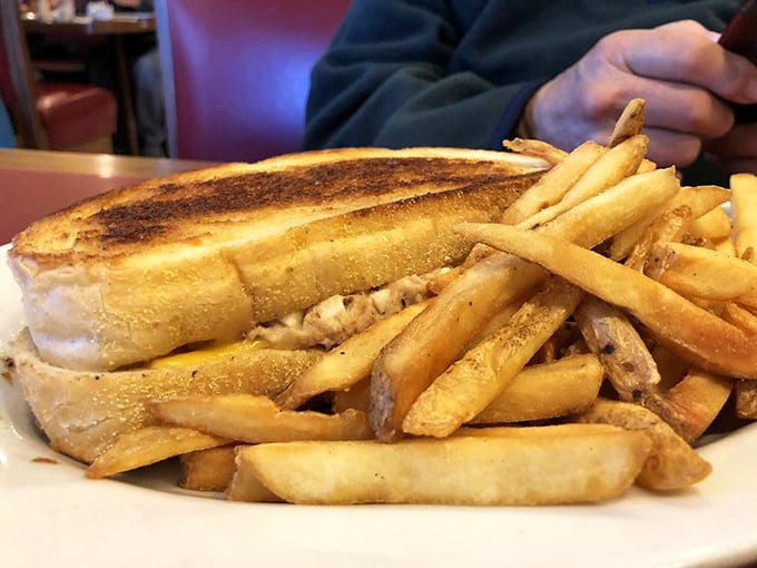 The humble grilled sandwich – elevated to art form. Crispy on the outside, melty on the inside, with fries that could make a potato proud.