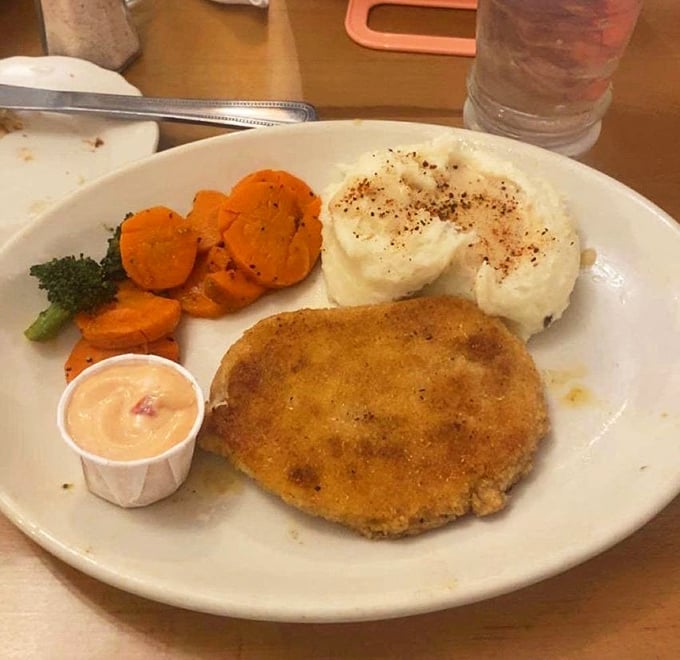 The turkey steak arrives with all the fixings – a Thanksgiving flashback that doesn't require listening to Uncle Bob's political opinions.
