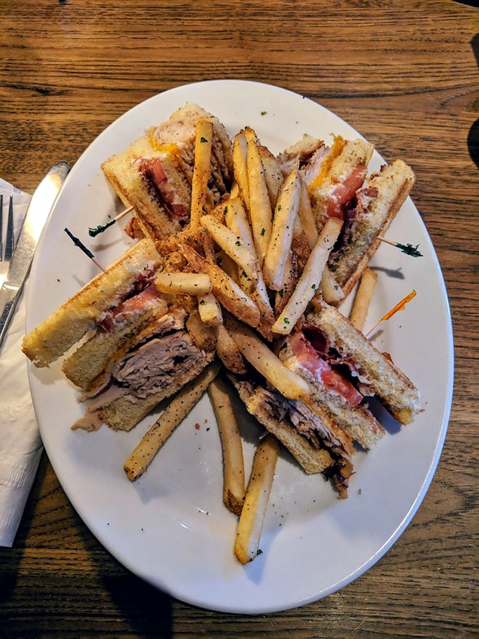 The club sandwich – architecture you can eat, where each layer tells its own delicious story.