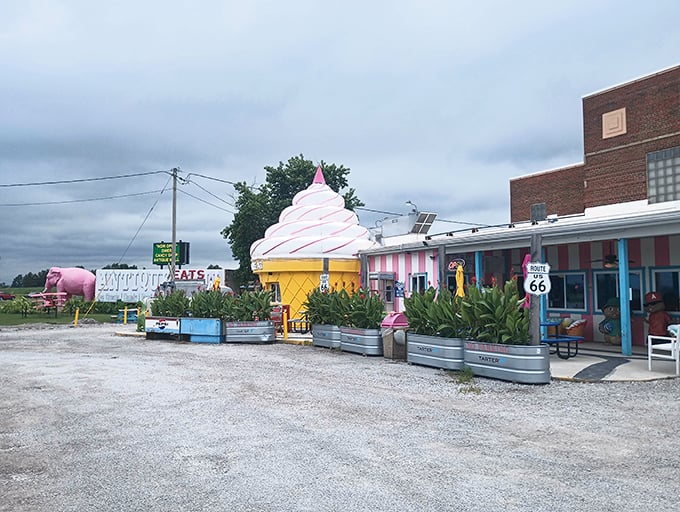 The Pink Elephant isn't alone in DeForest's whimsical landscape—that giant ice cream cone building proves Wisconsin takes dessert as seriously as cheese.