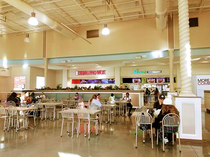 The bustling food court at lunchtime—proof that shopping burns calories that must be immediately replaced with Panda Wok deliciousness.