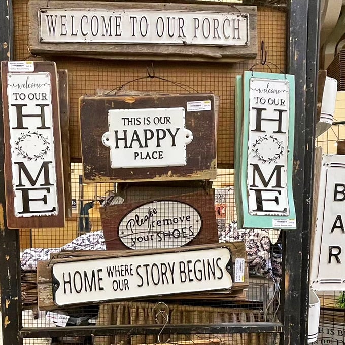 The wall of wisdom where every sign tells you what you already know but somehow still need to buy. "This is our happy place" indeed!