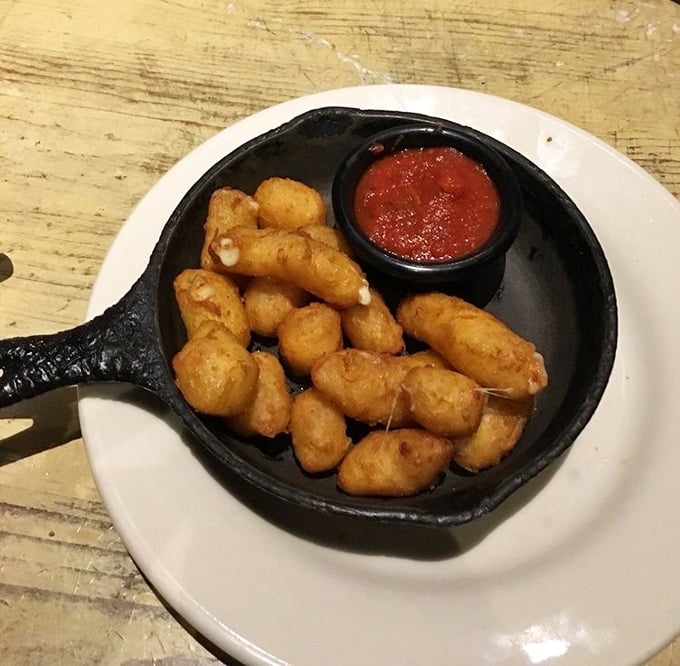 These White Cheddar Cheese Curds aren't just appetizers—they're little dairy grenades of happiness, served in a skillet that keeps them perfectly melty.