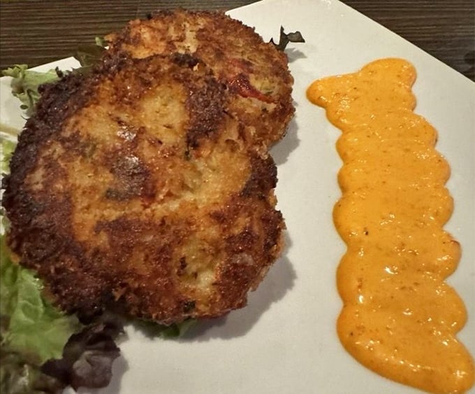 The Whitefish Cake: Door County's answer to Maryland crab cakes, golden-crisp outside and flaky-tender within.