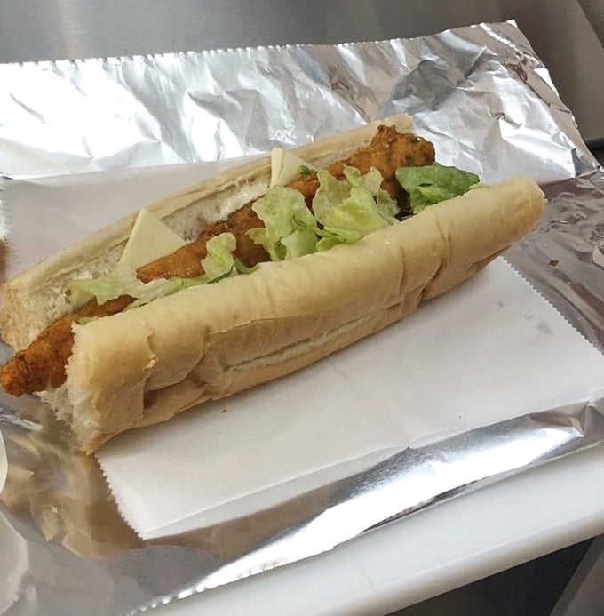 The whiting sandwich—where crispy, seasoned fish meets soft bread in a relationship that makes more sense than most Hollywood marriages.