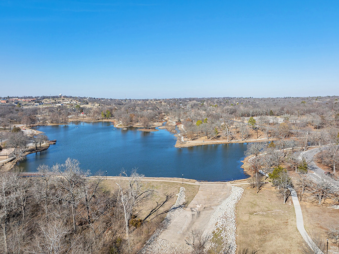 Wintersmith Park's serene lake isn't just pretty to look at—it's a free entertainment venue that's been soothing souls since the 1930s.