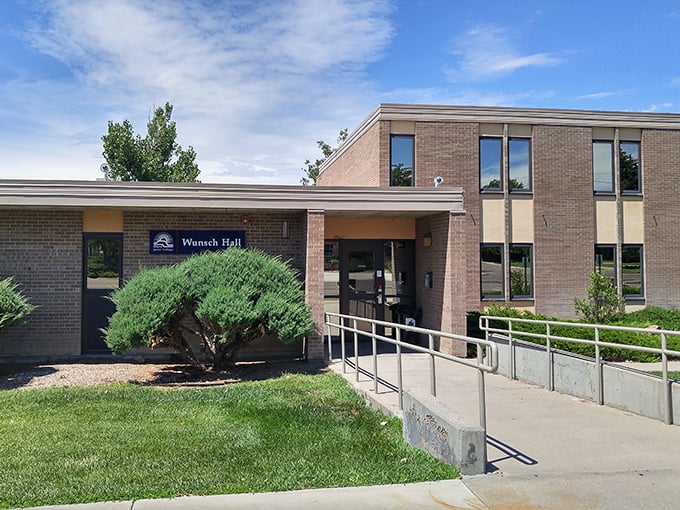 Wunsch Hall welcomes students with the architectural equivalent of a firm handshake—practical, unpretentious, and ready to get down to business.