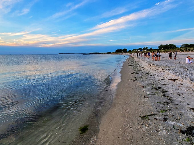 Sunset gatherings at Cape Charles Beach feel like a community ritual, where strangers become friends against a backdrop of pastel skies.