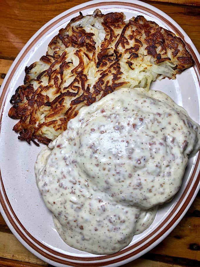 Biscuits and gravy that would make your Southern grandmother nod in approval. That creamy sausage gravy isn't just a topping—it's a life philosophy.