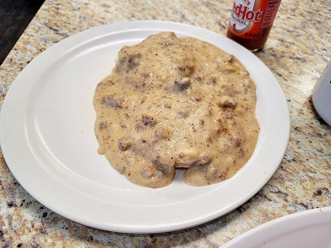Biscuits swimming in peppery gravy with chunks of sausage – breakfast's answer to "What does a hug taste like?" Pure Hoosier comfort.