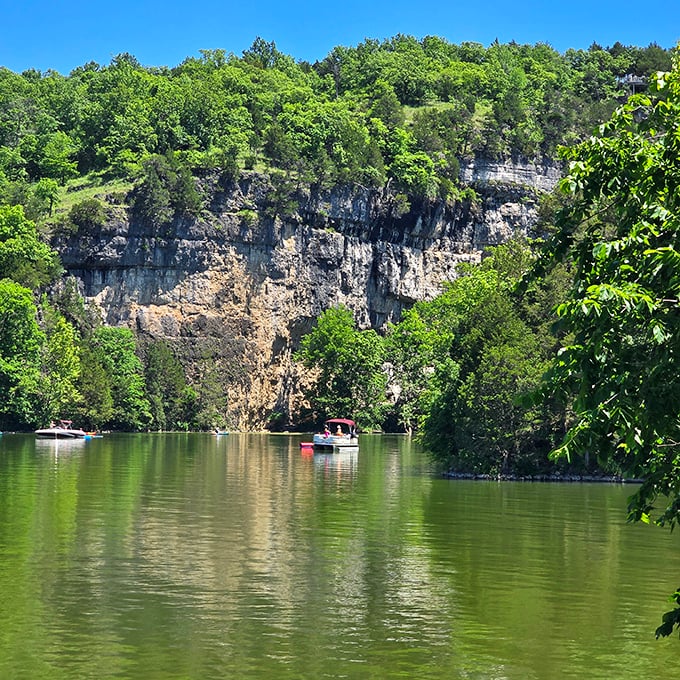 Limestone cliffs create nature's amphitheater for boaters exploring the lake. Like a geological Broadway, every seat offers a spectacular view.