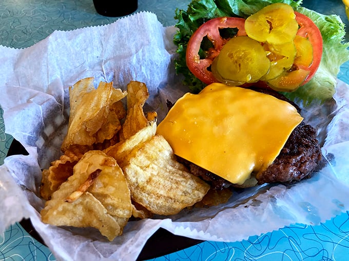 The star of the show—a cheeseburger that doesn't need height or gimmicks to achieve greatness. Those house-made chips aren't just sidekicks; they're co-stars.