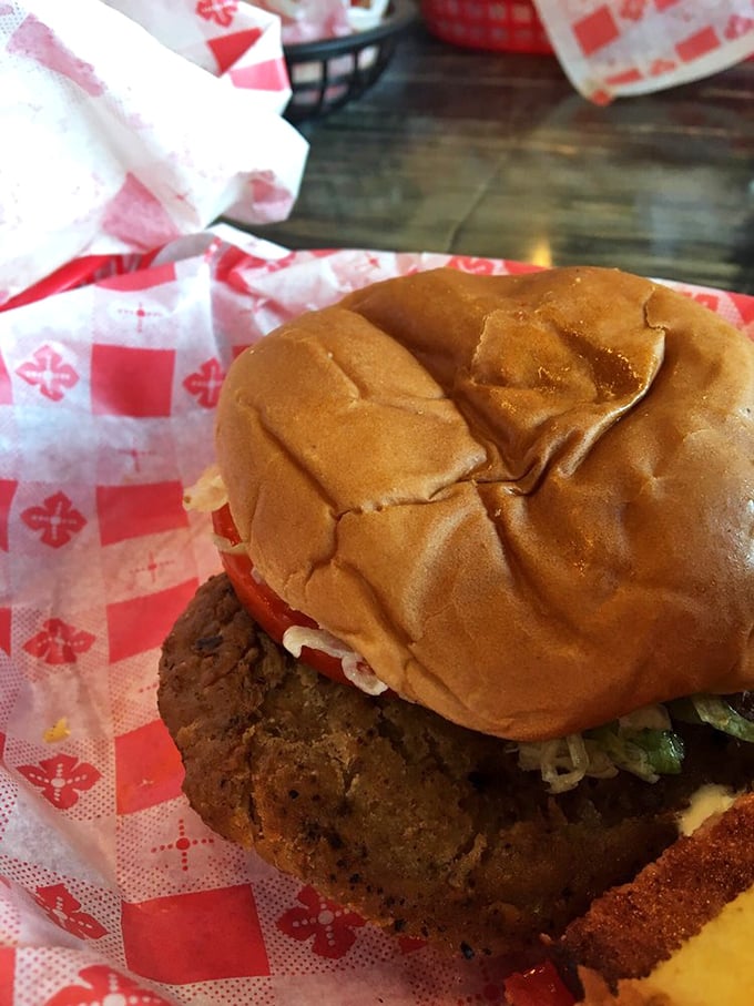 This isn't just a burger—it's architectural perfection between buns, where every layer plays its part in the symphony of flavors.