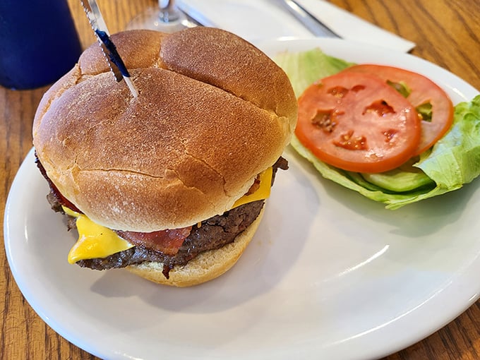 A burger that doesn't need Instagram filters to look good – just honest beef, melty cheese, and a bun that knows its supporting role perfectly.