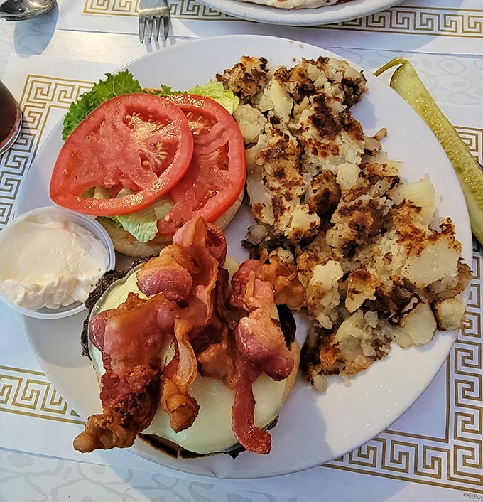 The burger arrives with crispy hash browns and thick-cut tomatoes – a trio that's performed together longer than The Rolling Stones and with better reviews.
