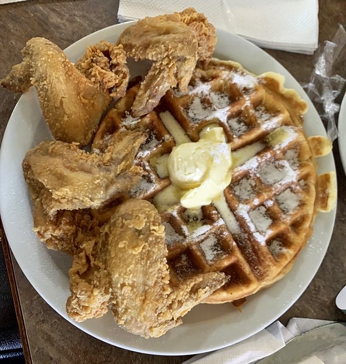 Chicken and waffles: the culinary equivalent of a perfect marriage. Sweet meets savory in a relationship that actually works.